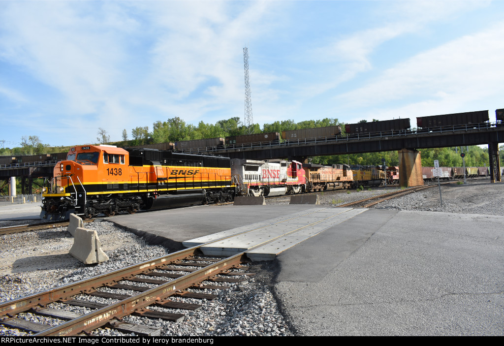 BNSF 1438 leads a transfer to up's neff yard